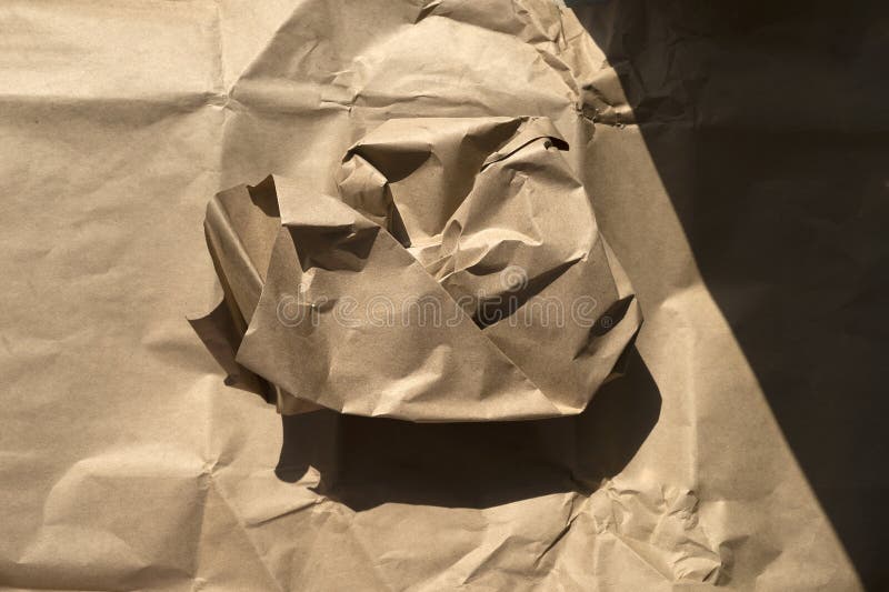 Crumpled Kraft Paper Lies on the Surface Stock Image - Image of rough ...