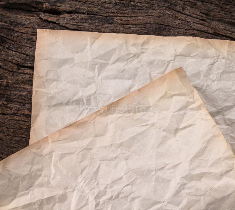 Crumpled Old Paper on Wooden Plate Stock Image - Image of pattern, aged ...