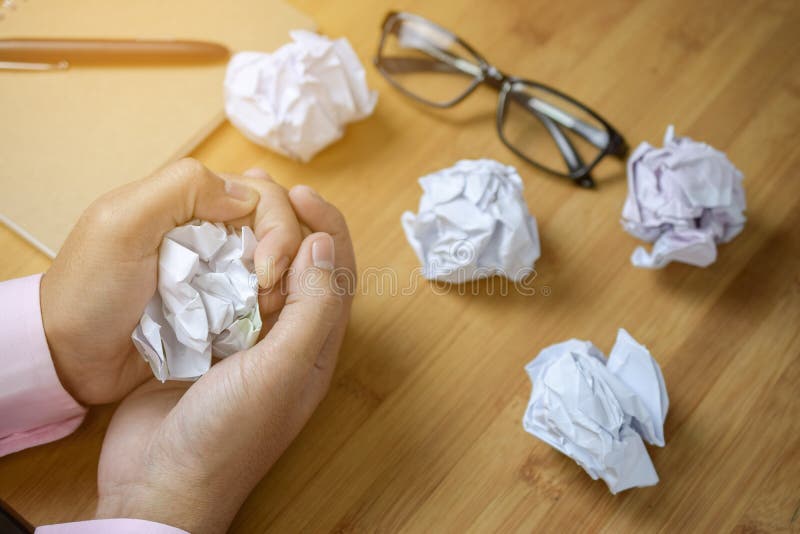 Crumpled Paper Ball in Hand on Office Table Stock Photo - Image of ...