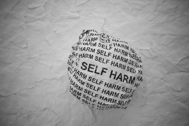 Crumpled Paper Ball with Words Self Harm on Torn White Paper Pieces ...
