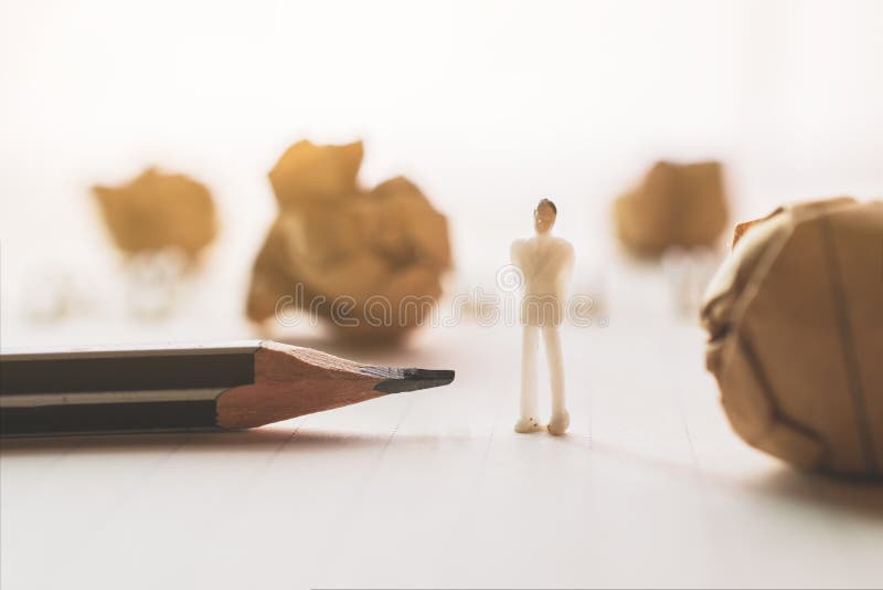 Crumpled Paper and Pencil with Miniature Miniature People Problem ...