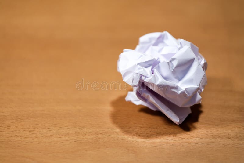 Crumpled paper on a table. stock image. Image of frame - 64169961