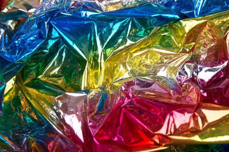 Crumpled Rainbow Wrapping Paper with Shiny Effect. Close Up Stock Image ...