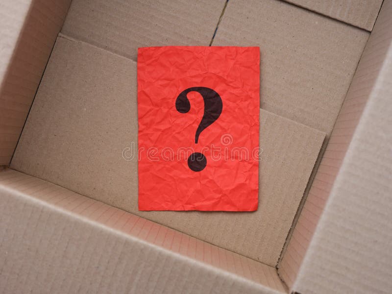 A Crumpled Red Piece of Paper with a Question Mark on it in a Cardboard ...