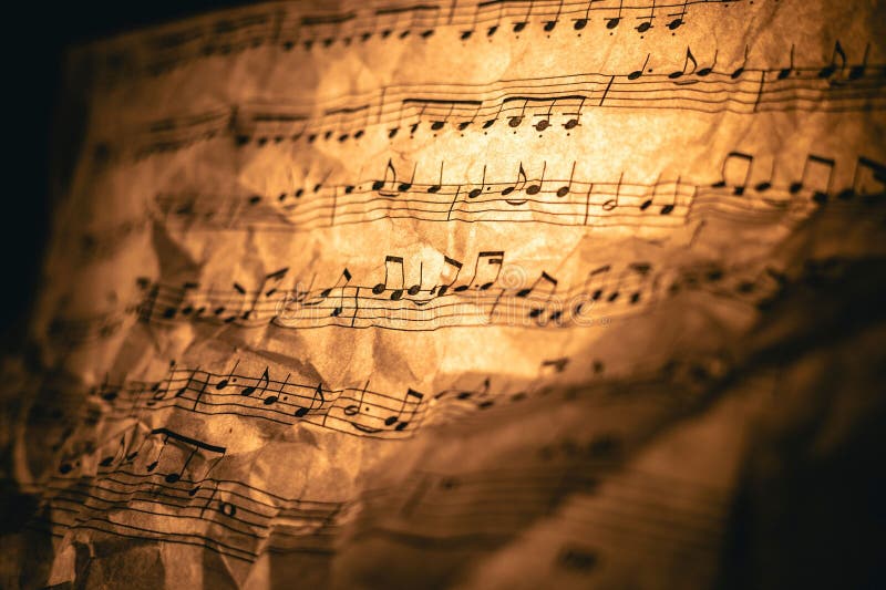 Crumpled Sheet of Music Illuminated by Warm Light Stock Image - Image ...