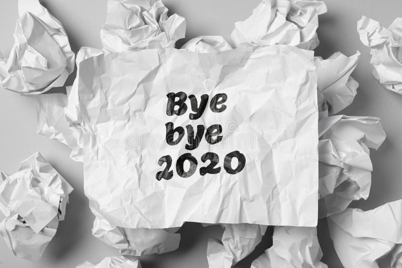 Crumpled Sheet with Phrase Bye Bye 2020 among Paper Balls on Light Grey ...