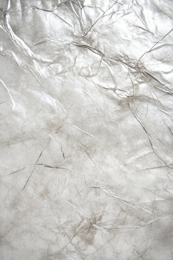 Crumpled Silver Paper Texture with Shiny Metallic Surface Stock Image ...