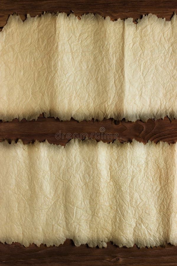 Crumpled Vertical Sheet of Paper on a Wooden Table, Grunge Background ...