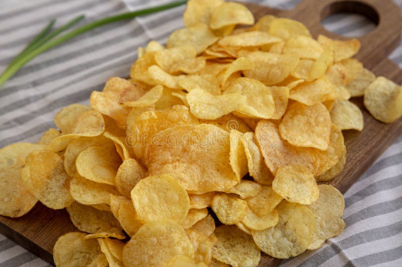 Crunch Onion Potato Chips on a Board, Side View Stock Photo - Image of ...