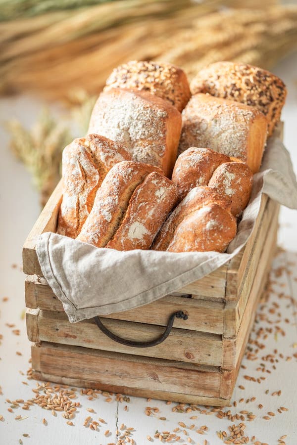 Crunchy Buns in Wooden Box with Grains Stock Photo - Image of gourmet ...