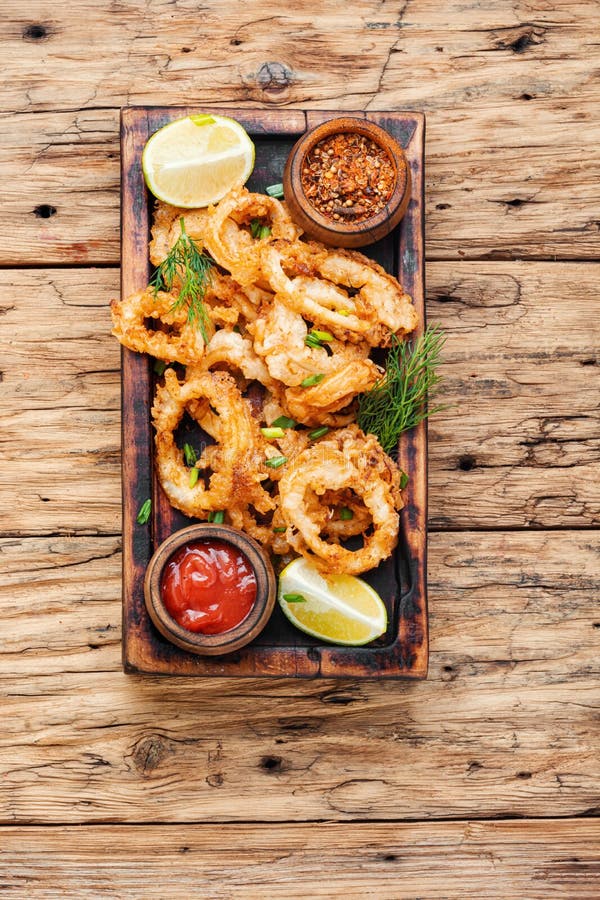 Fried squid rings breaded stock image. Image of deepfried - 169154365