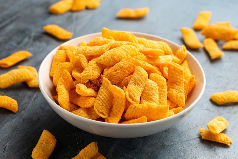Crunchy Nacho Cheese Corn Snack in White Bowl Stock Image - Image of ...