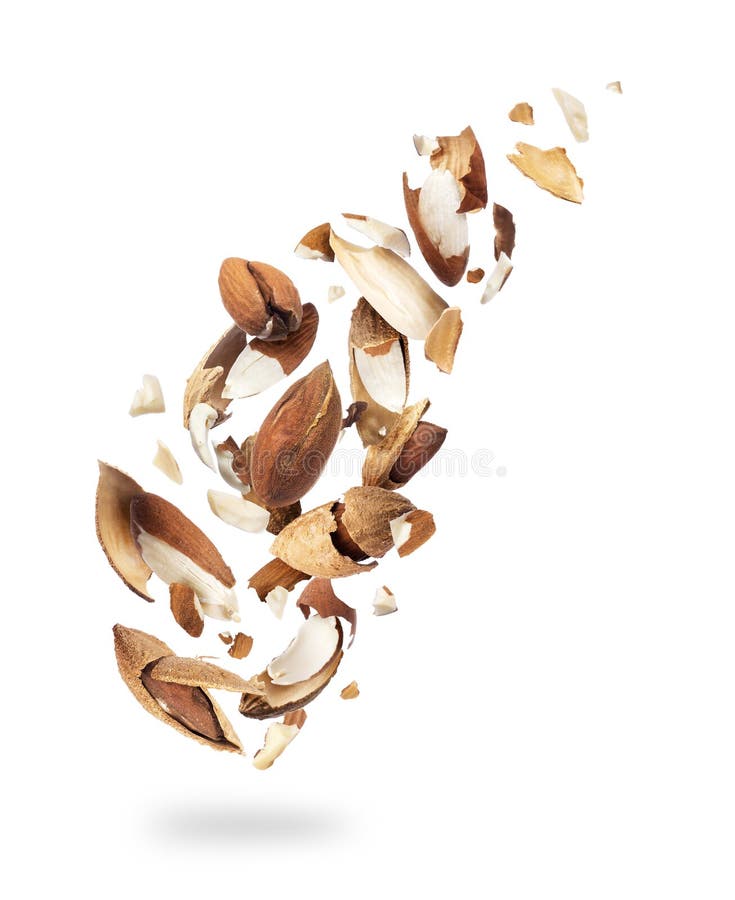 Crushed Almonds in the Air into Many Pieces Isolated on White ...
