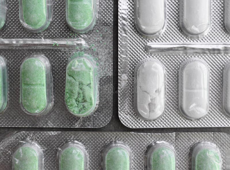 Crushed and Damaged Tablets. Concept of Expired Drugs Stock Photo ...