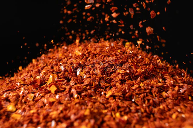 Crushed Dried Chili Sprinkle on Pile, Black Background, Macro Stock ...