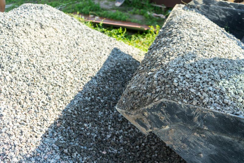 Crushed Granite. Bucket Typed by the Loader Stock Photo - Image of soil ...