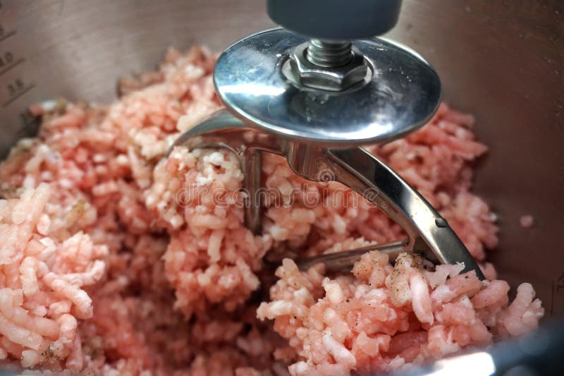 The Crushed Meat on the Meat Grinder. Mincemeat in a Bowl Stock Image ...
