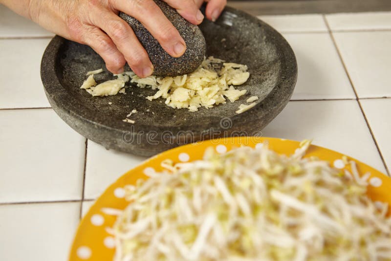 Crushing Garlic stock image. Image of health, grind, cinnamon - 18181233 Crushing Garlic stock image. Image of health, grind, cinnamon - 18181233