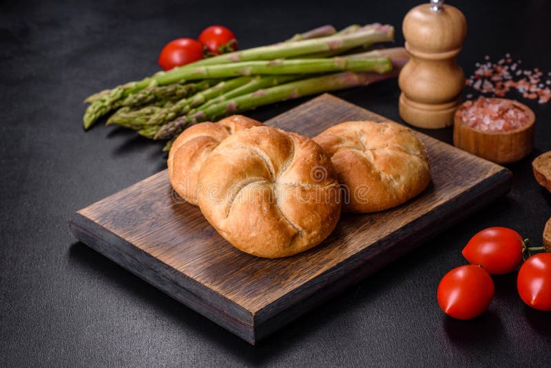 Crusty Round Bread Rolls, Known As Kaiser or Vienna Rolls on a Cutting ...