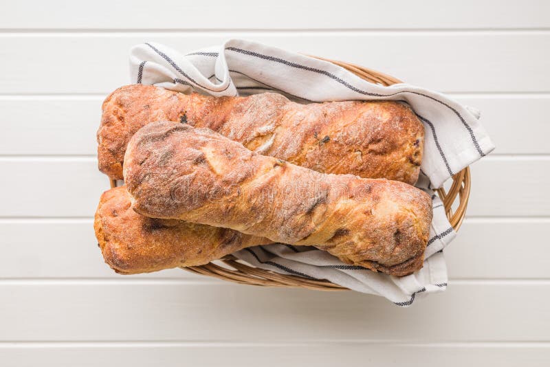 Crusty Rustic Baguette in Basket on White Table. Top View Stock Photo ...