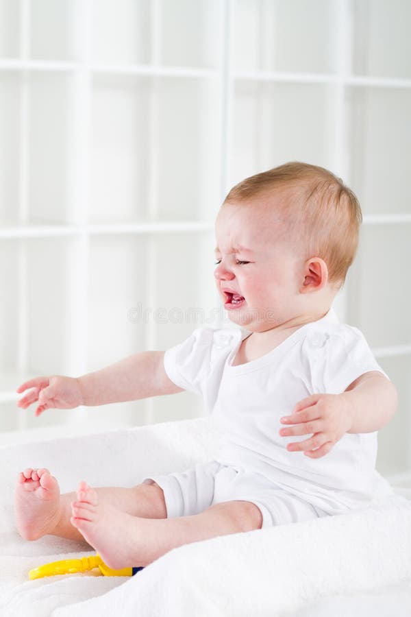 Crying baby on the snow stock image. Image of girl, emotion - 4887151