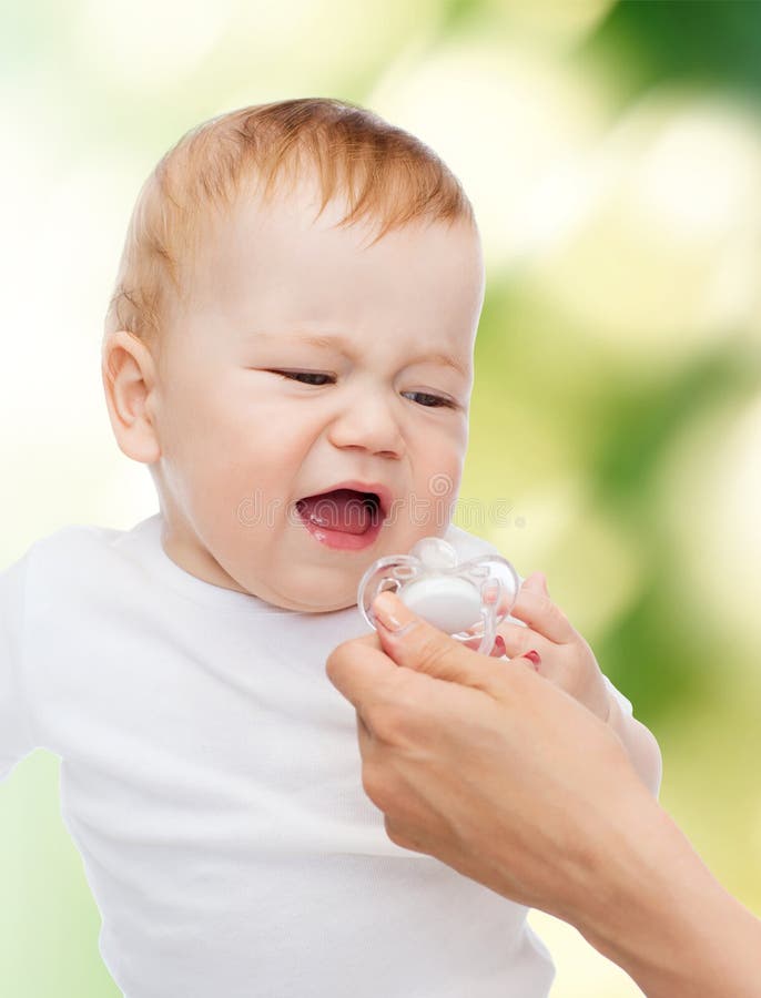 Crying baby with dummy stock photo. Image of baby, care - 42266870