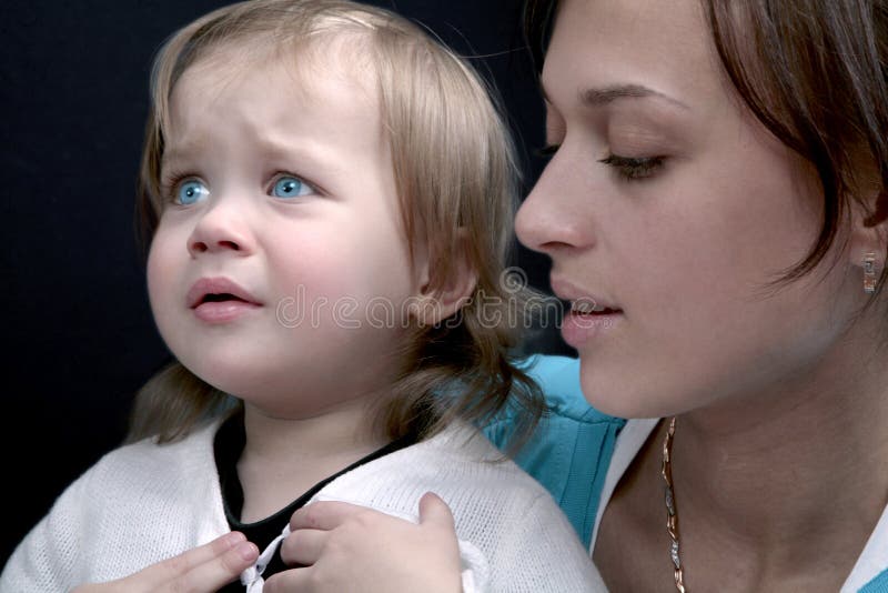 Crying baby with mom stock image. Image of family, childhood - 6003053