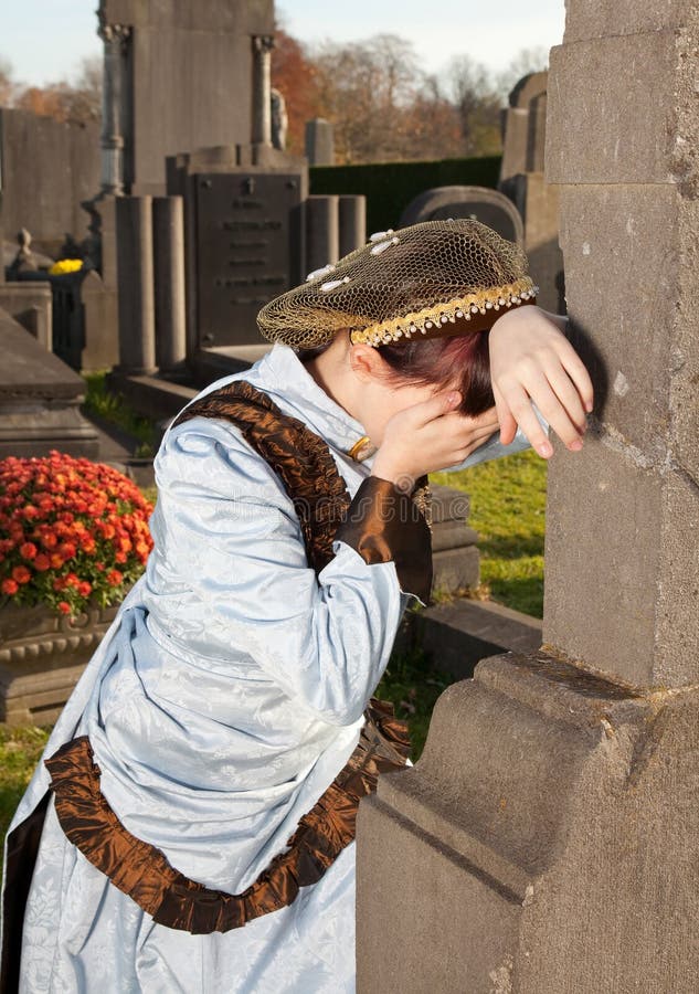 Crying in a graveyard stock photo. Image of tomb, hopeless - 26803394