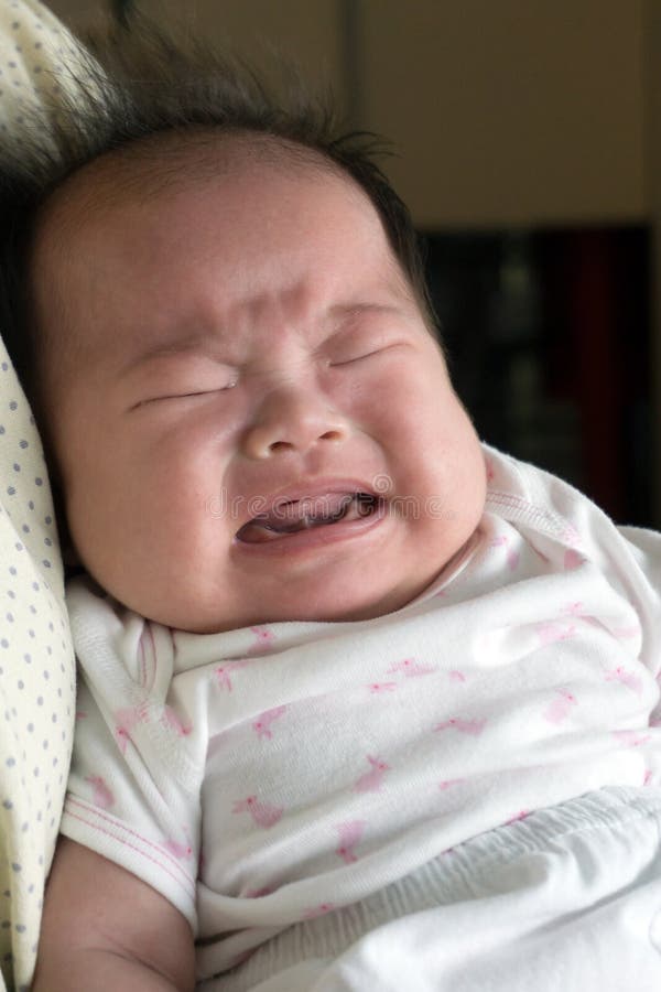 Crying infant stock photo. Image of female, healthy, asian - 63618628