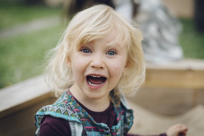 Crying little blond girl stock photo. Image of emotion - 92771398