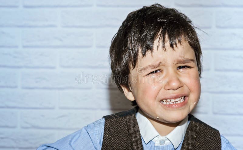 Crying little boy stock image. Image of little, grimacing - 99717361