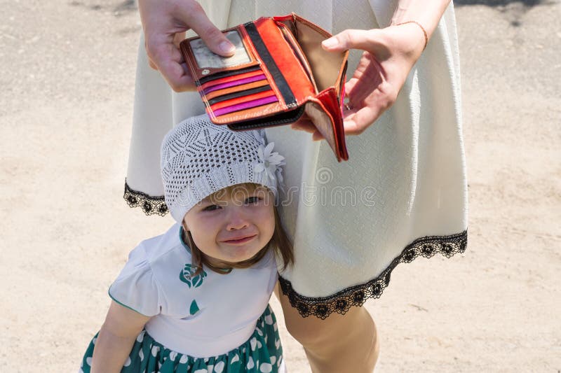 Crying Little Girl and Empty Wallet Stock Photo - Image of purse ...
