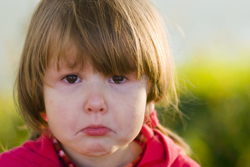 Crying little girl looking stock photo. Image of eyes - 3265918