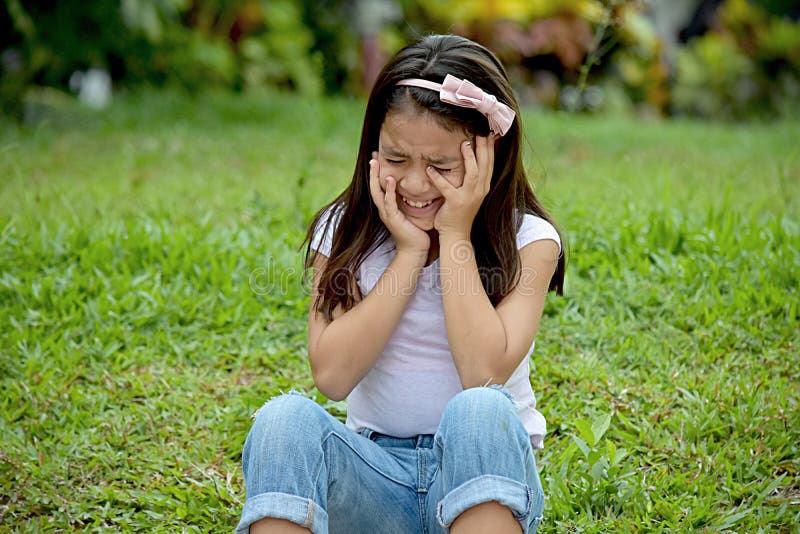 A Crying Petite Girl Youth stock photo. Image of girl - 157871264