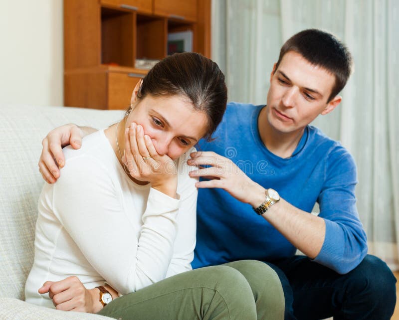 Sad Woman Hugging Her Husband Stock Photo - Image of issues, couple ...