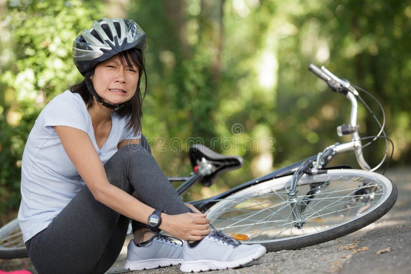 Crying Woman with Pain after Fallen Down from Bicycle Stock Photo ...