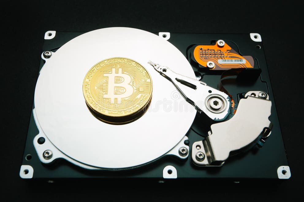 Crypto Currency Bitcoin Against the Hard Disk Drive Stock Image - Image ...