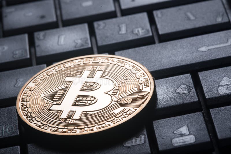 Crypto Currency Gold Bitcoin on the Computer Keyboard Stock Image ...