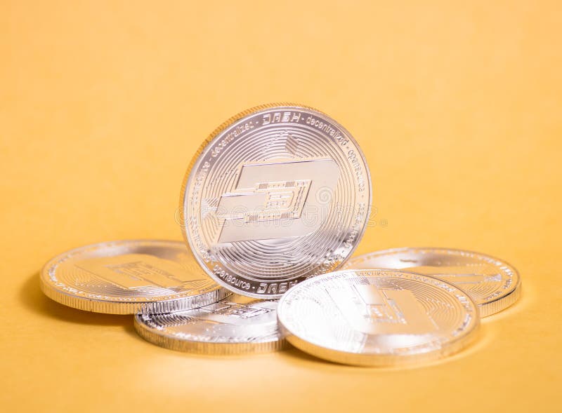 Crypto-currency: Dashkoin and Smartphone on a Gray Concrete Background ...