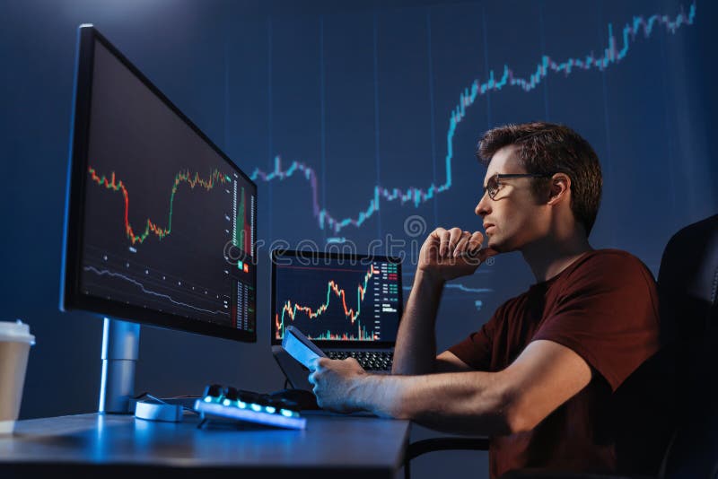 Crypto Trader Sitting in Front of Computers, Making Professional ...