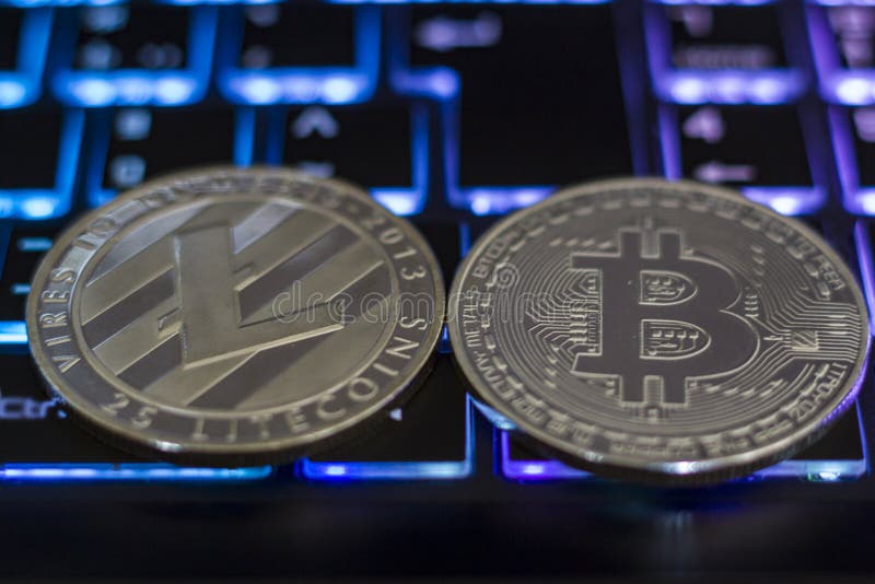 Cryptocurrency Coins on Computer Keyboard Stock Photo - Image of ...