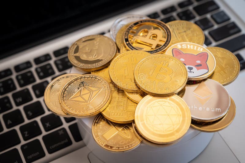Various Kinds of Cryptocurrency Token Coins on Laptop Keyboard ...