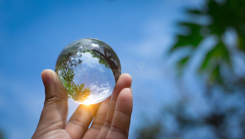 Crystal Ball for Eco Friendly or Sustainable Resources Concept. Saving ...