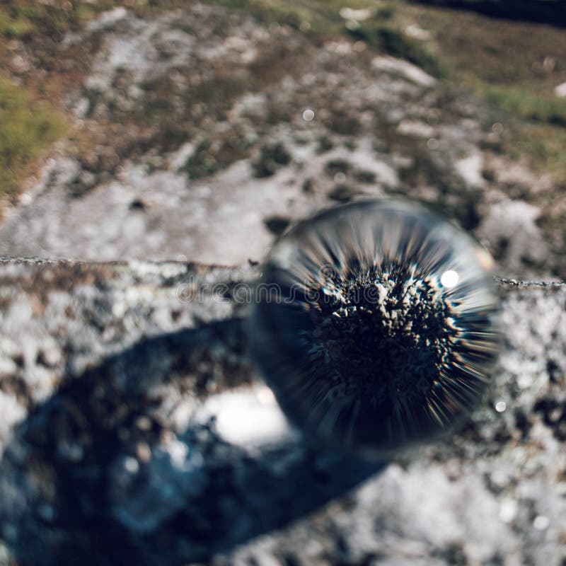 Crystal Ball on the Ground with the Surrounding Reflecting on it Stock ...