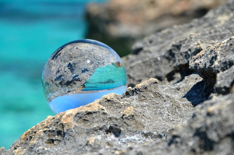 Crystal ball on rocks stock photo. Image of rock, beautfiful - 94470618