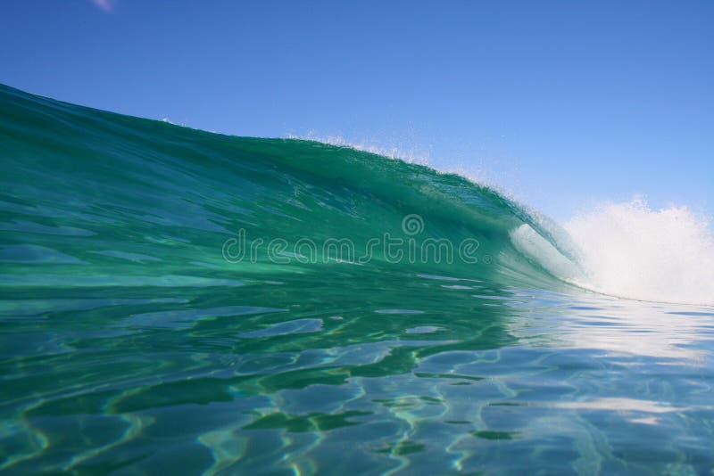 Crystal clear ocean wave stock image. Image of energy - 15347817