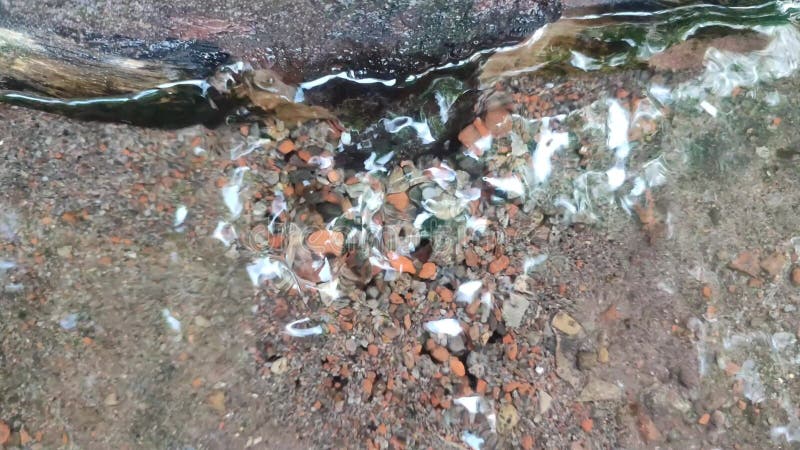 Crystal-clear Spring Water Flows Gently from Its Natural Sourcee Stock ...