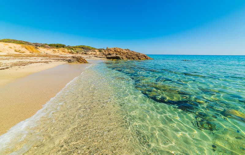 Crystal Clear Water in Santa Giusta Beach Stock Photo - Image of ...