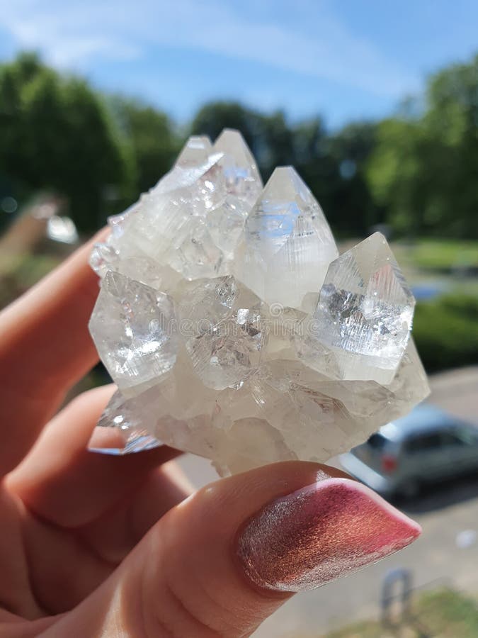 Crystal Cluster in Womans Hand on the Balcony Stock Image - Image of ...