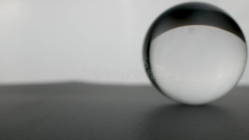Crystal Glass Ball Sphere Transparent Rolling on Grey Gradient ...